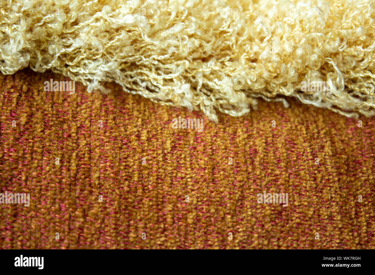Close up of texture of a woven material with different texture at top ...