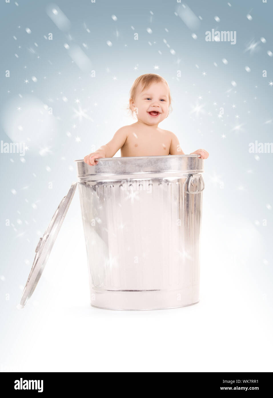 picture of adorable baby in trash can Stock Photo - Alamy