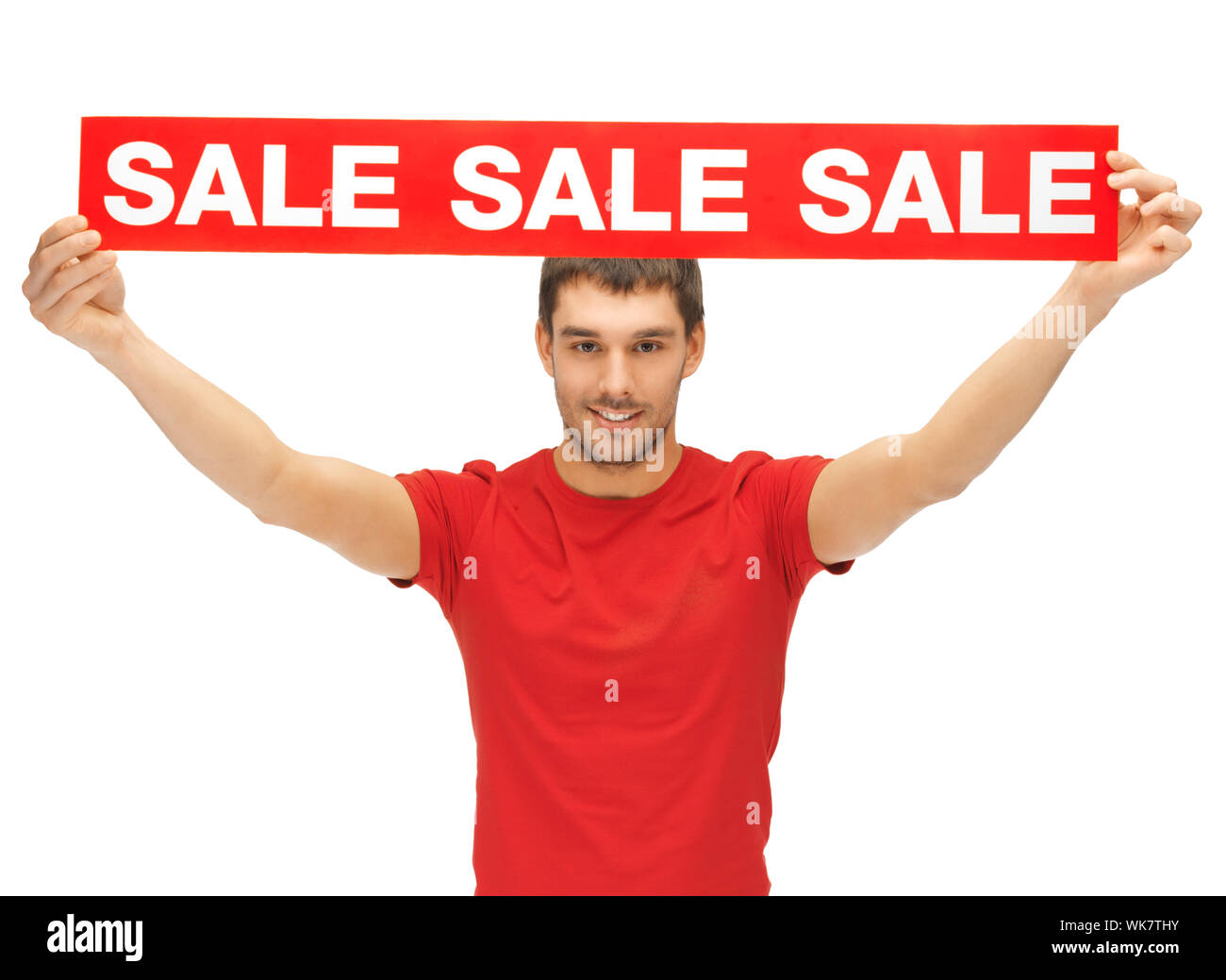 bright picture of handsome man with sale sign Stock Photo - Alamy
