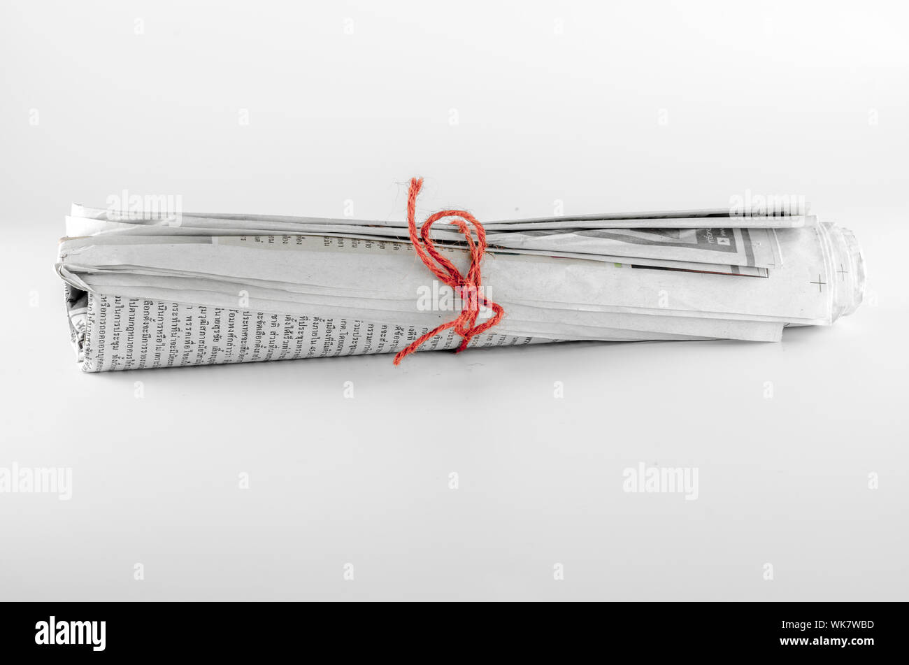Rolled Up Newspaper High Resolution Stock Photography and Images - Alamy