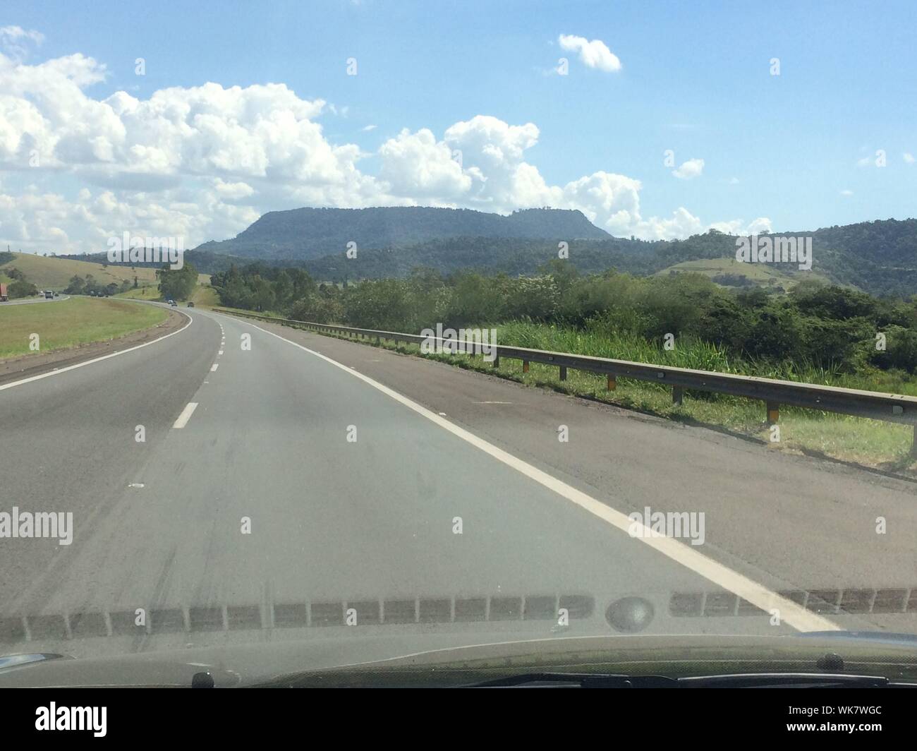 Highway through mountains hi-res stock photography and images - Alamy