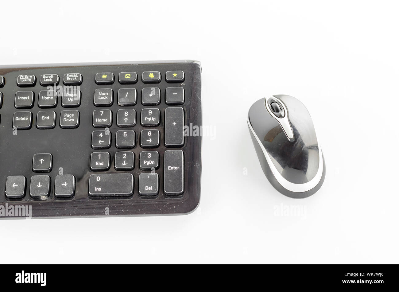 keyboard and wireless mouse on a white background Stock Photo - Alamy