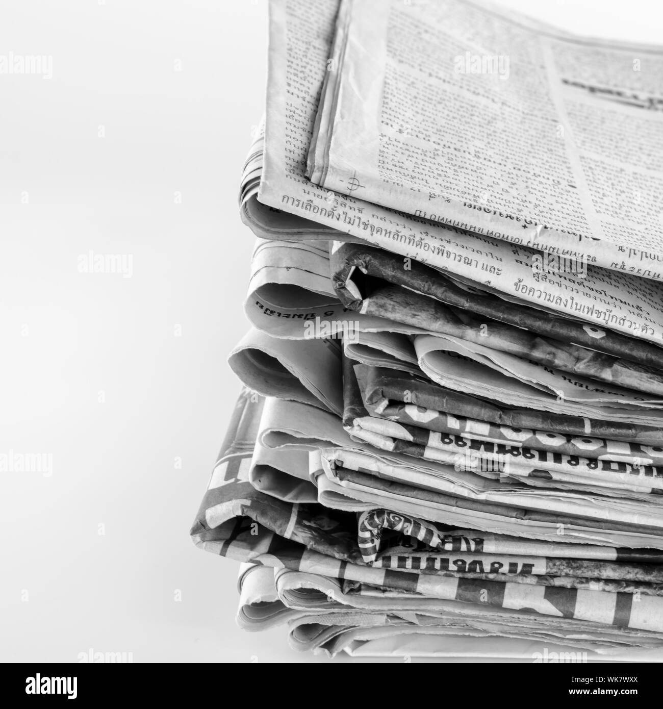 black and white stack of newspaper Stock Photo - Alamy
