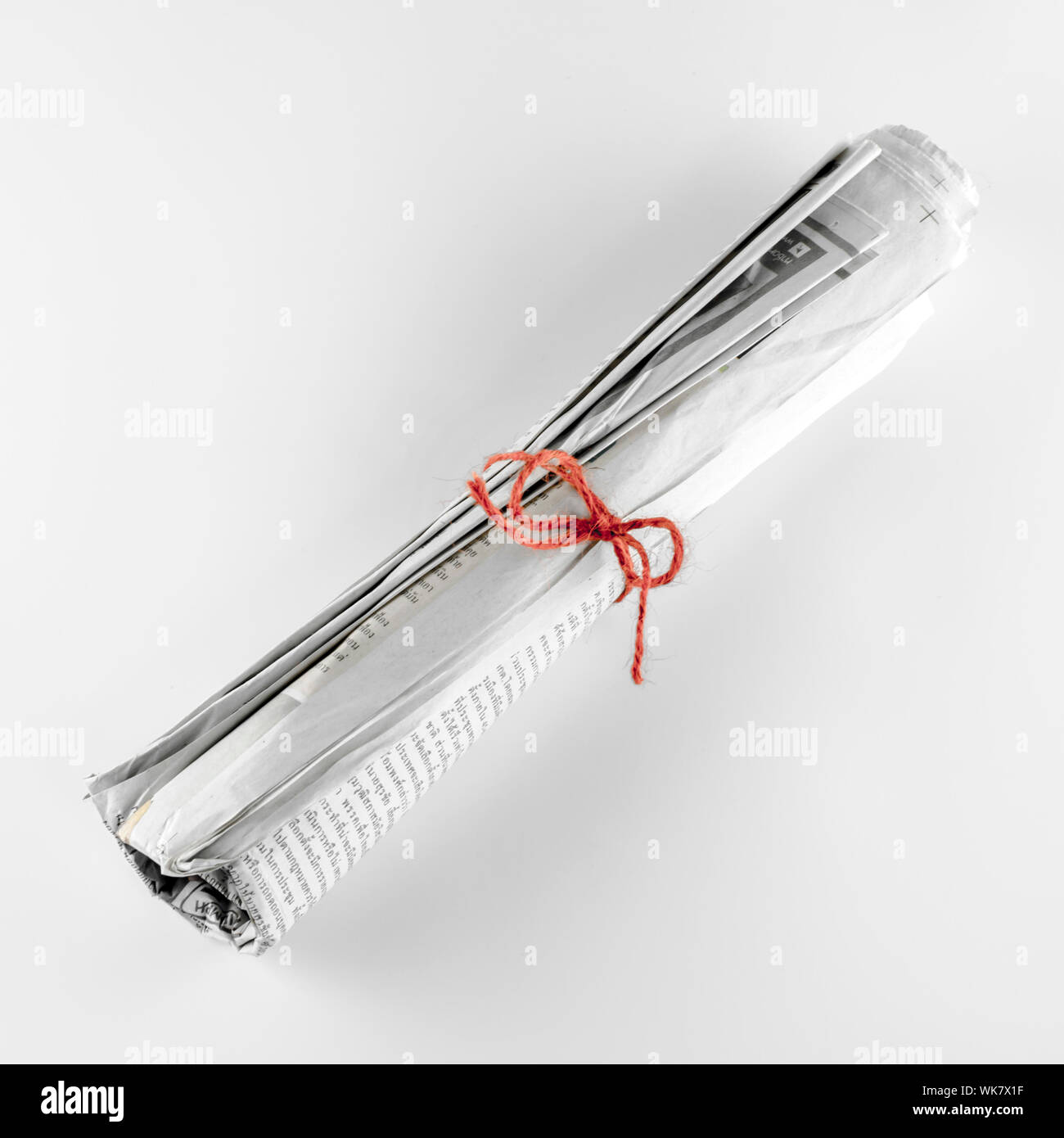Rolled up newspaper hi-res stock photography and images - Alamy
