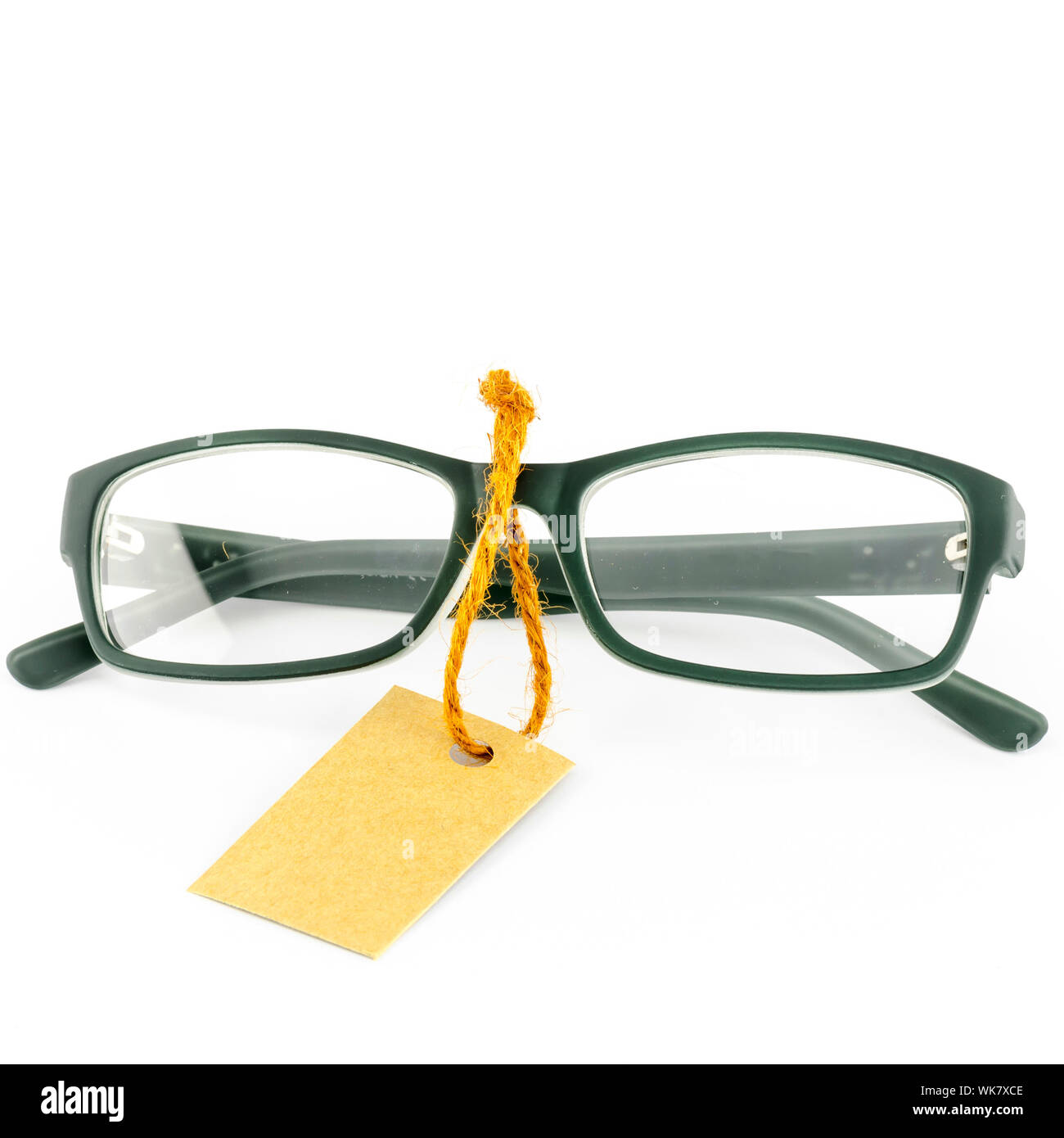 glasses and cost tag on a white background Stock Photo - Alamy