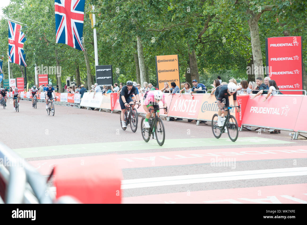 Cyclists cross finish Line on the Mall after completing RideLondon ...