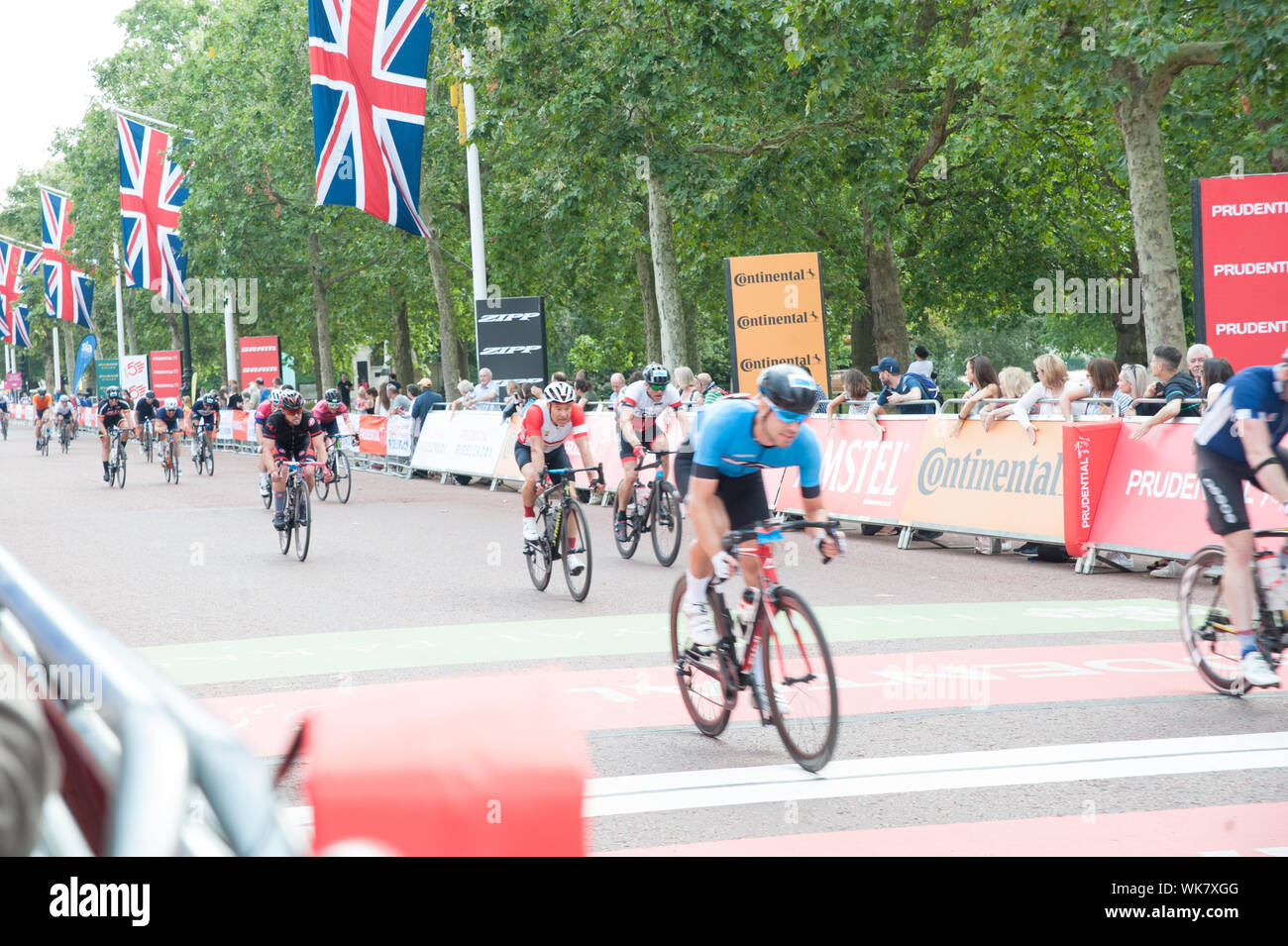 Cyclists cross finish Line on the Mall after completing RideLondon ...