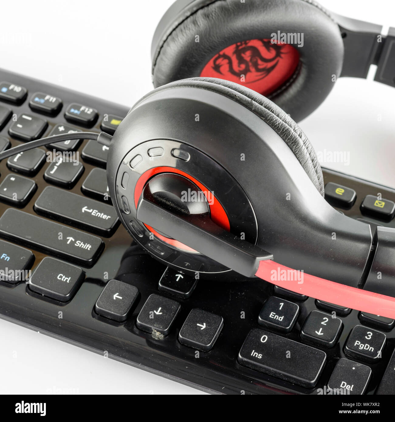 keyboard computer and headphone on a white background Stock Photo - Alamy