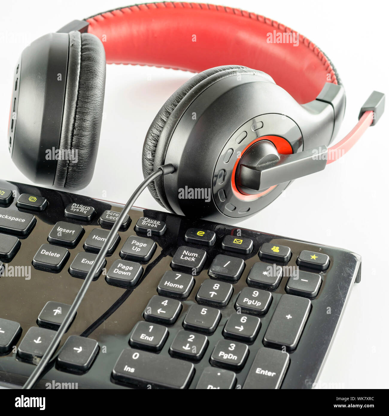 keyboard computer and headphone on a white background Stock Photo - Alamy