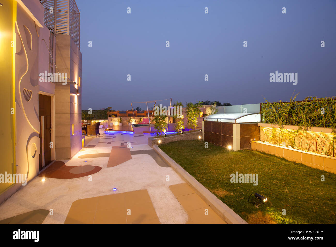 Modern house with lawn Stock Photo - Alamy