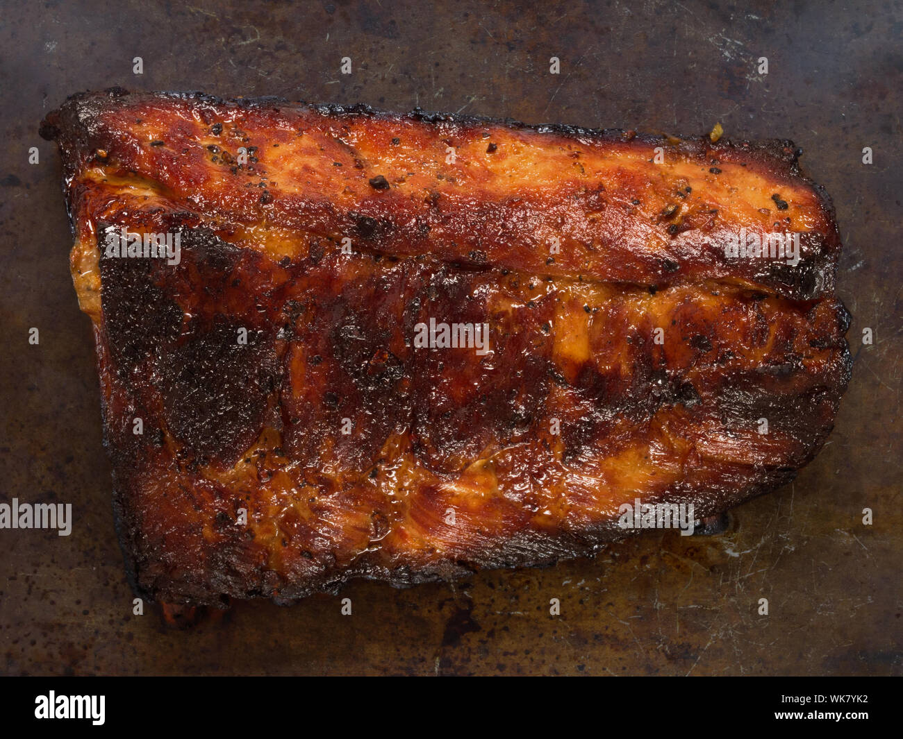 close of slab of rustic barbecued pork ribs Stock Photo - Alamy