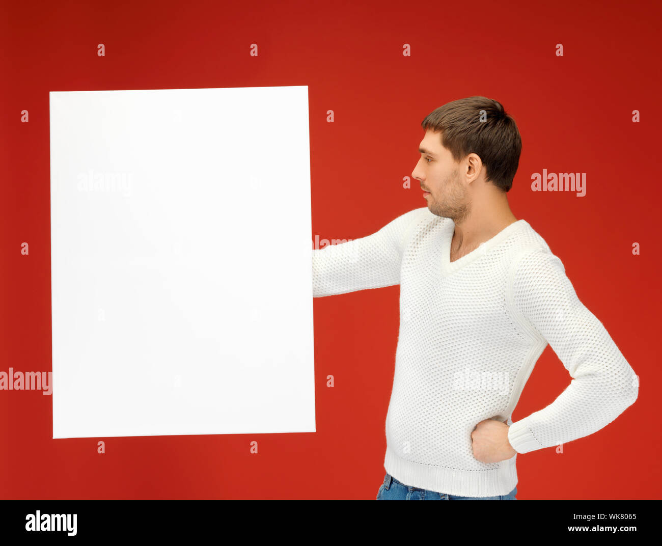 handsome man with big blank board Stock Photo - Alamy