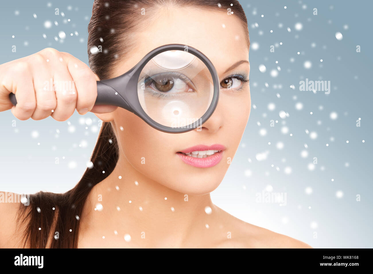 woman with magnifying glass Stock Photo - Alamy