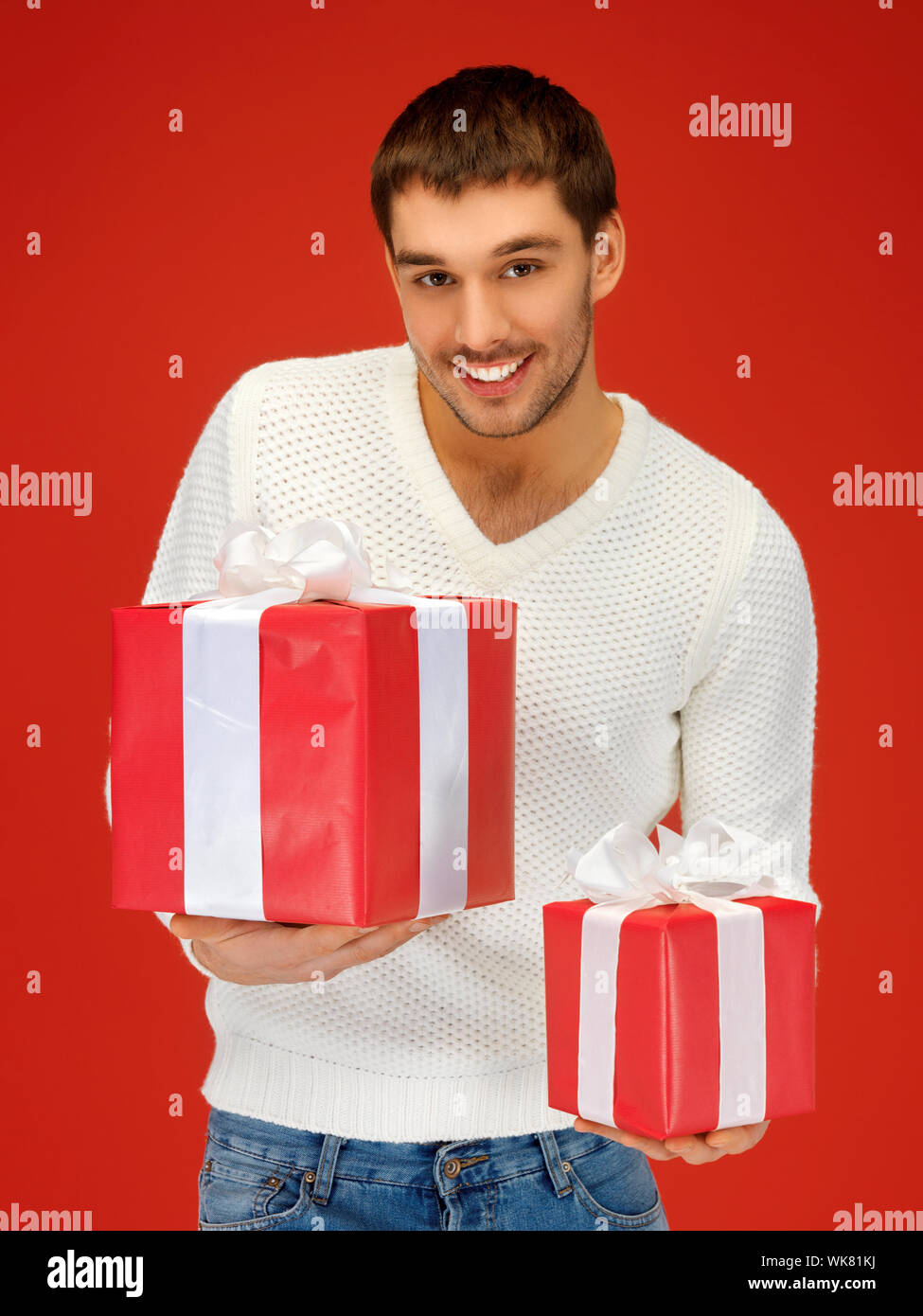 man holding many gift boxes Stock Photo - Alamy