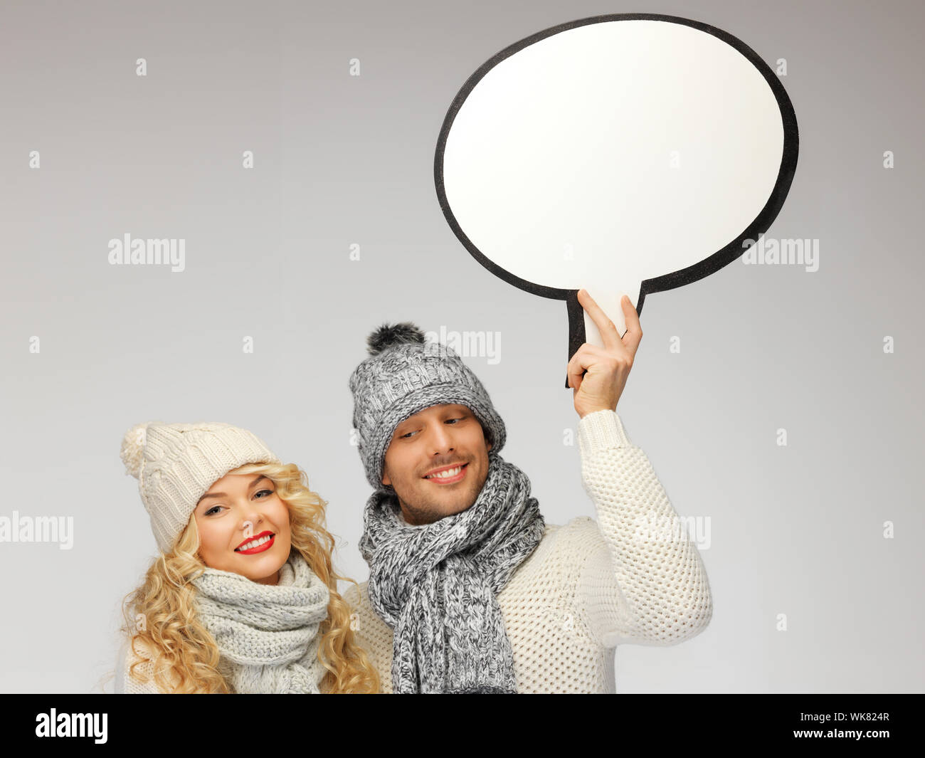 family couple with blank text bubble Stock Photo - Alamy