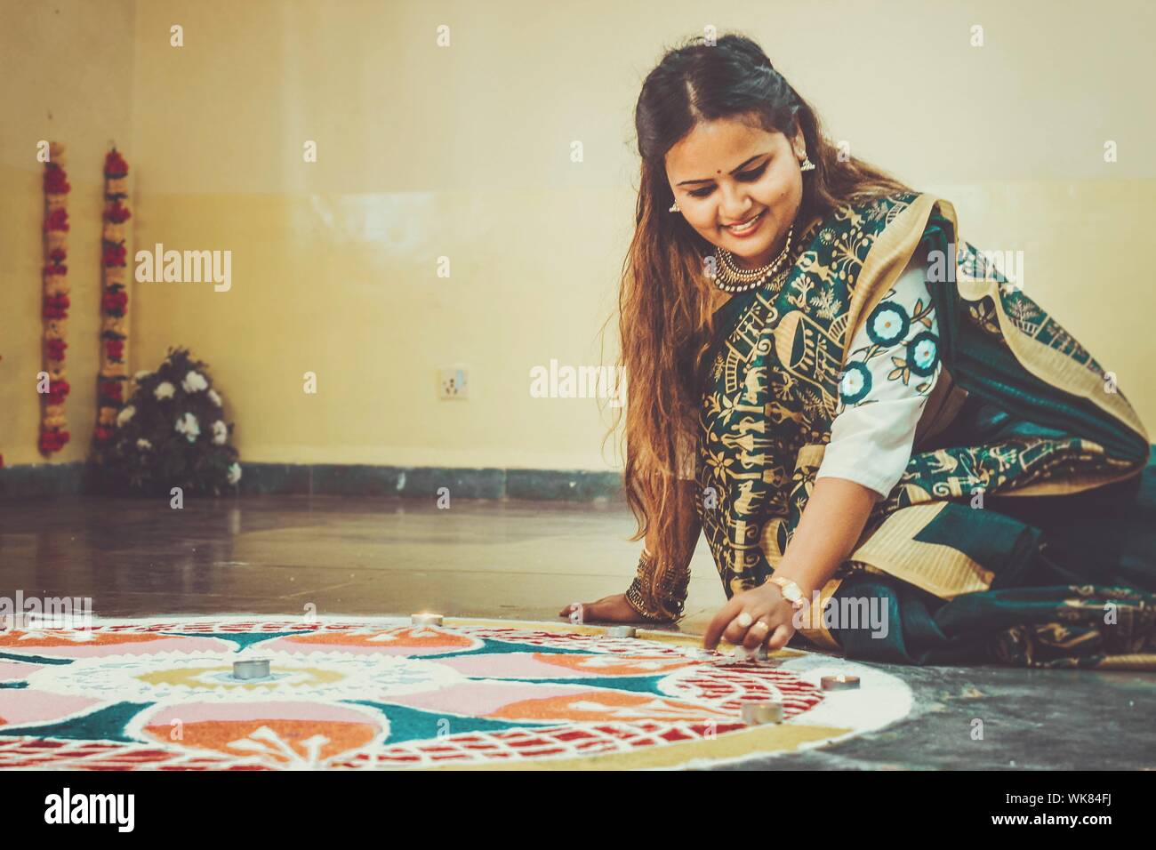 Rangoli woman hi-res stock photography and images - Alamy