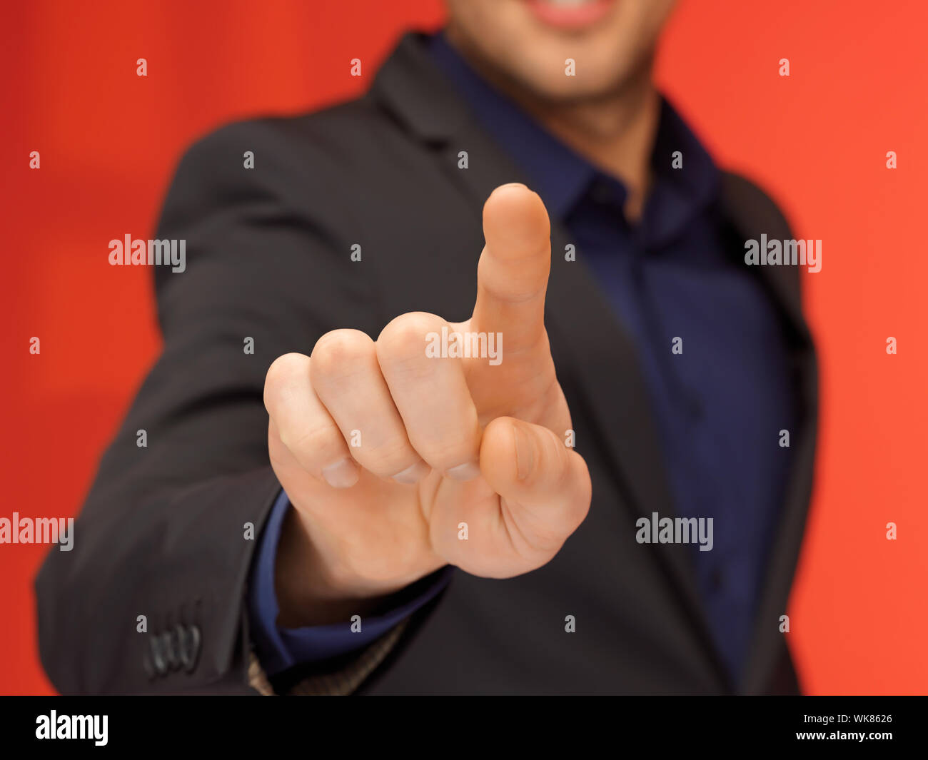 bright picture of handsome man in suit pressing virtual button Stock ...
