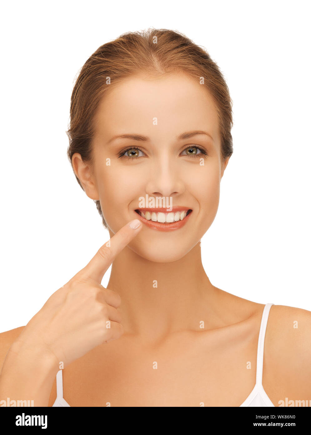 picture of beautiful woman pointing to teeth Stock Photo - Alamy