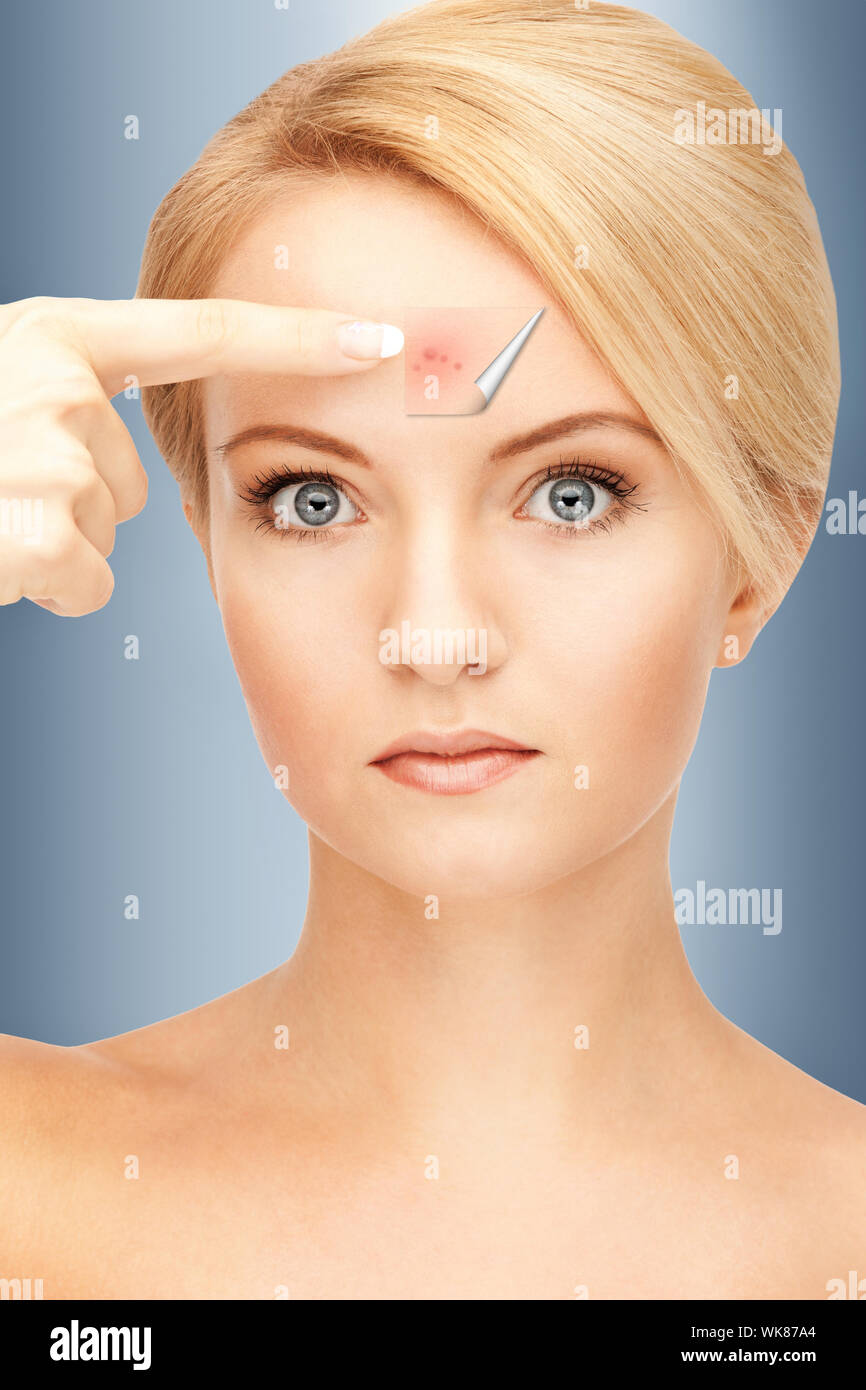 Beautiful woman pointing forehead hi-res stock photography and images ...