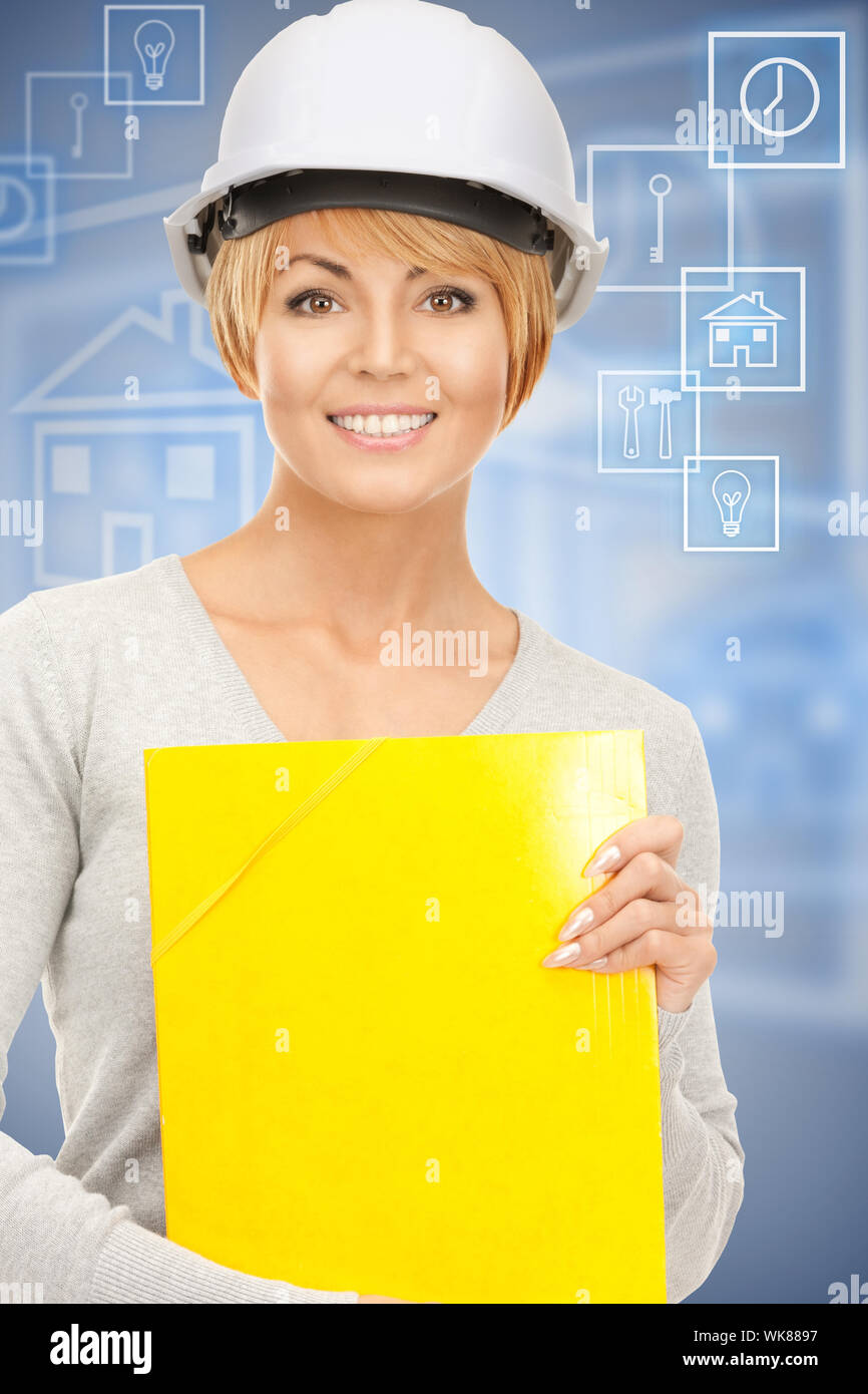 Female contractor in helmet folder hi-res stock photography and images ...