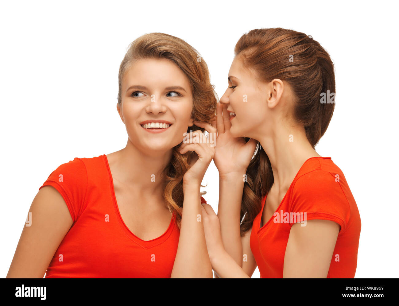 two talking teenage girls in red t-shirts Stock Photo - Alamy