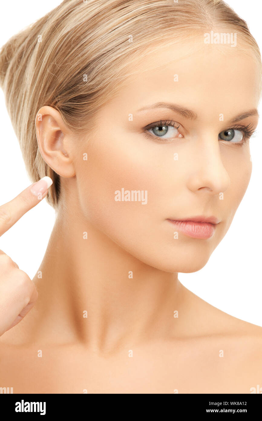 woman pointing to ear Stock Photo - Alamy
