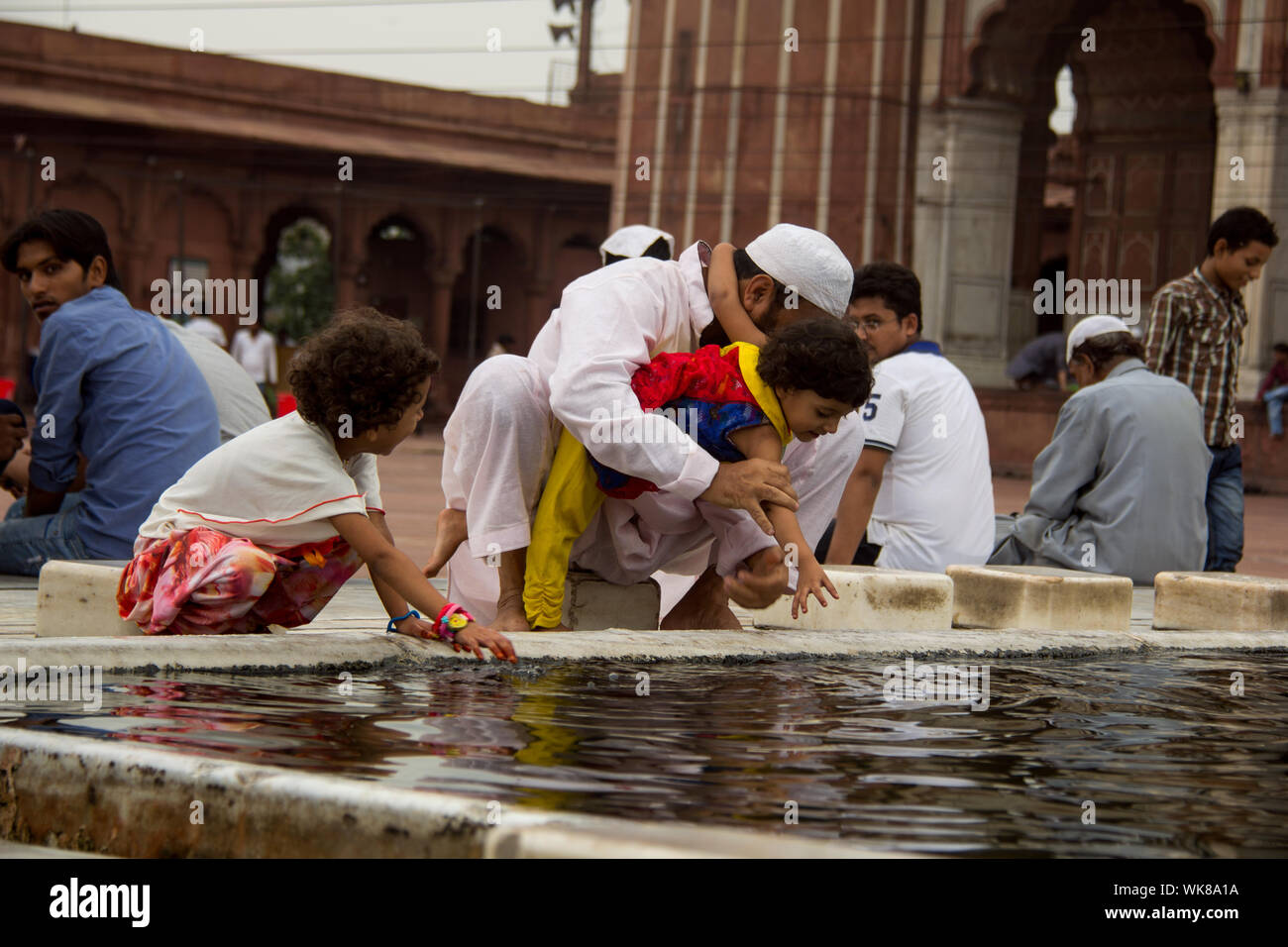 Indian family praying hi-res stock photography and images - Alamy