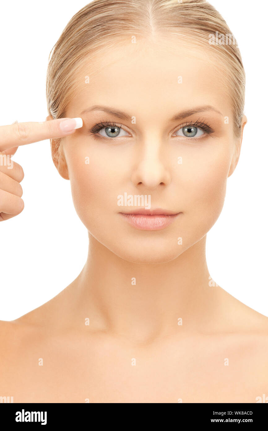 picture of beautiful woman pointing to eye Stock Photo - Alamy