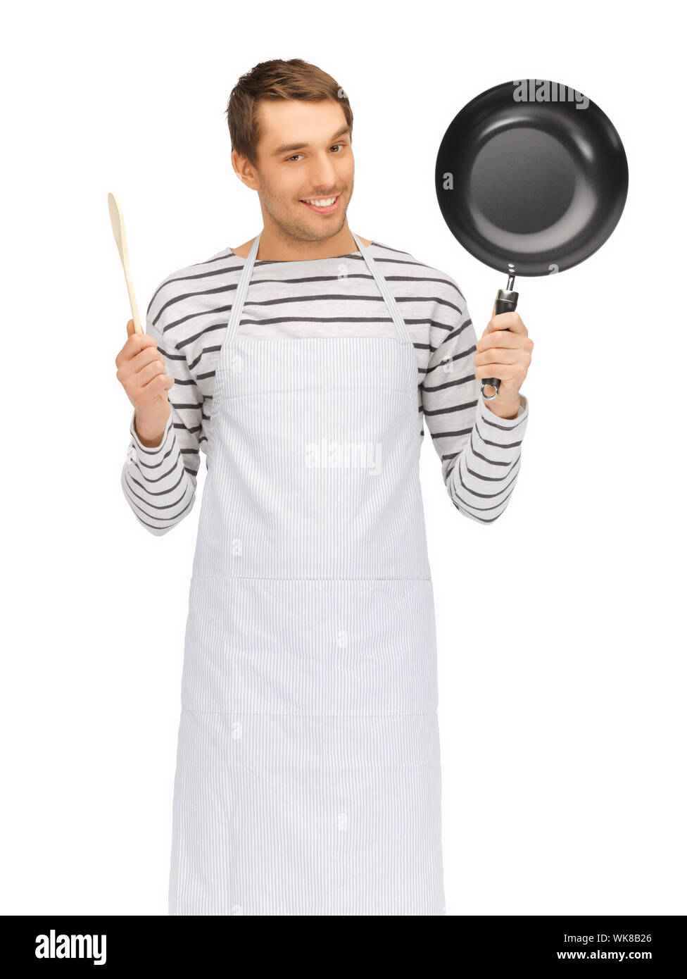 handsome man with pan and spoon Stock Photo - Alamy
