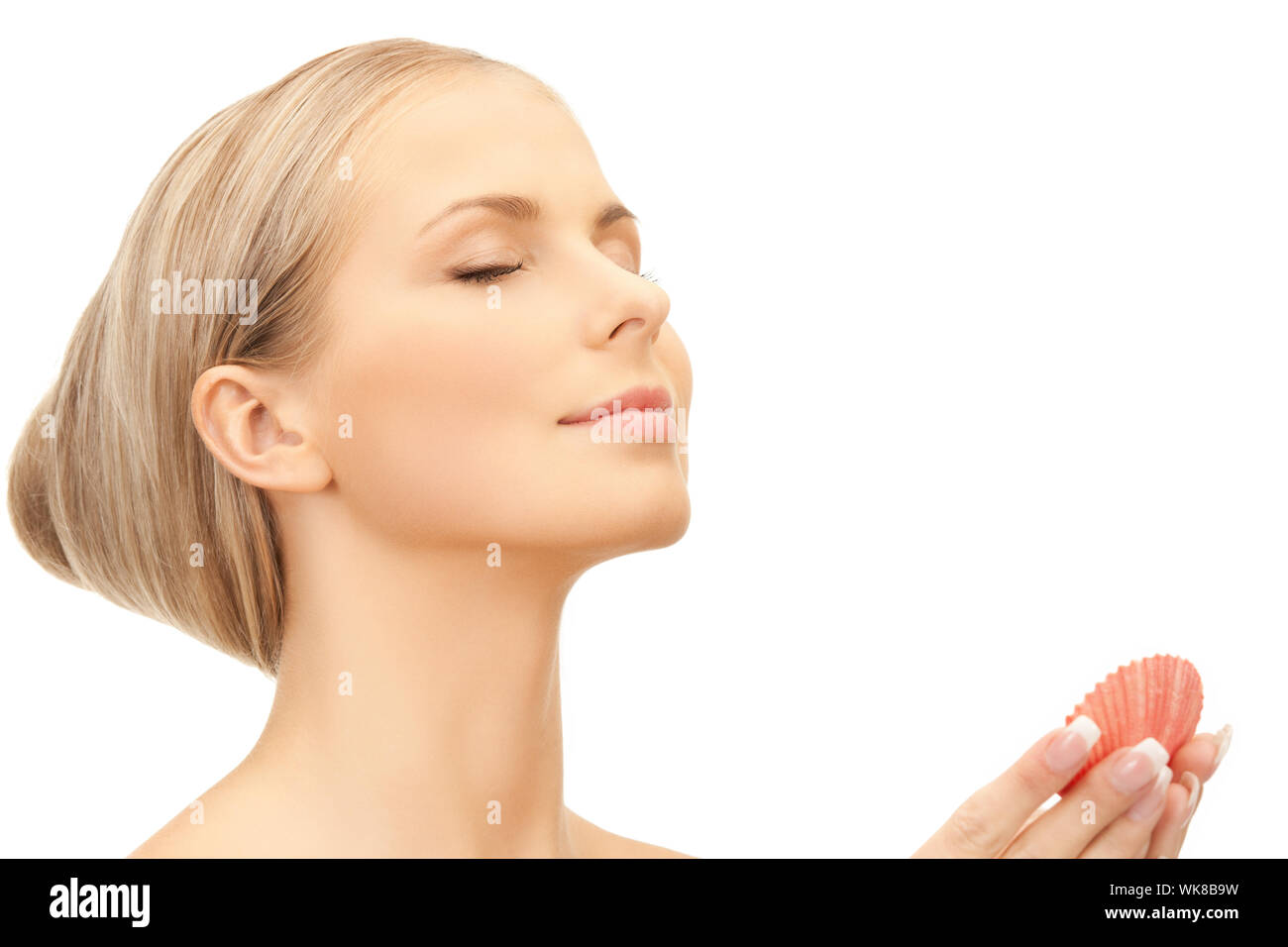 beautiful woman with seashell Stock Photo - Alamy