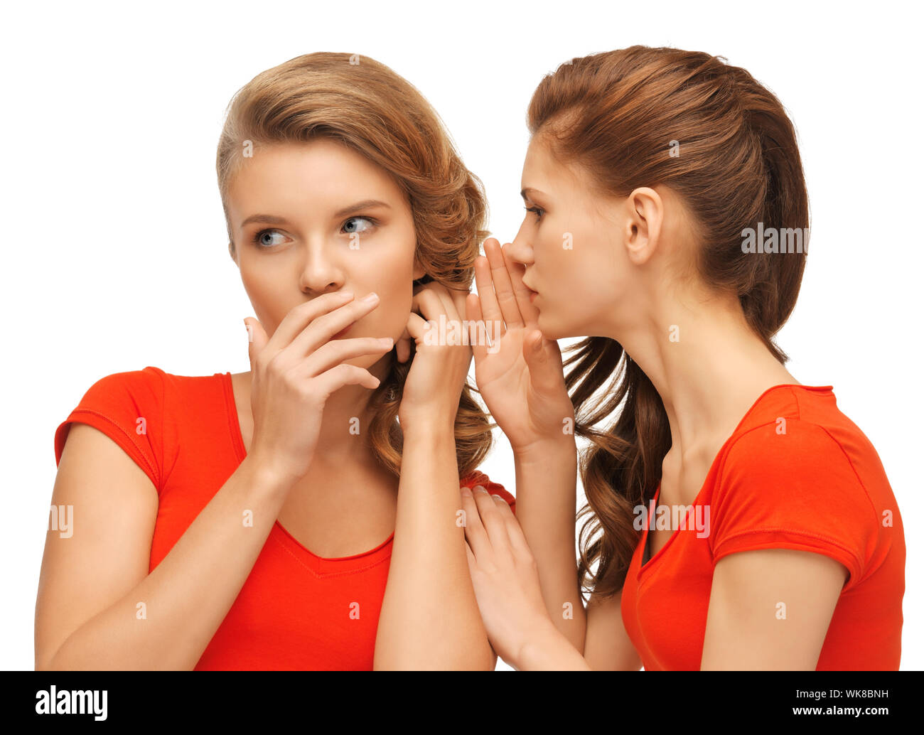 picture of two talking teenage girls in red t-shirts Stock Photo - Alamy