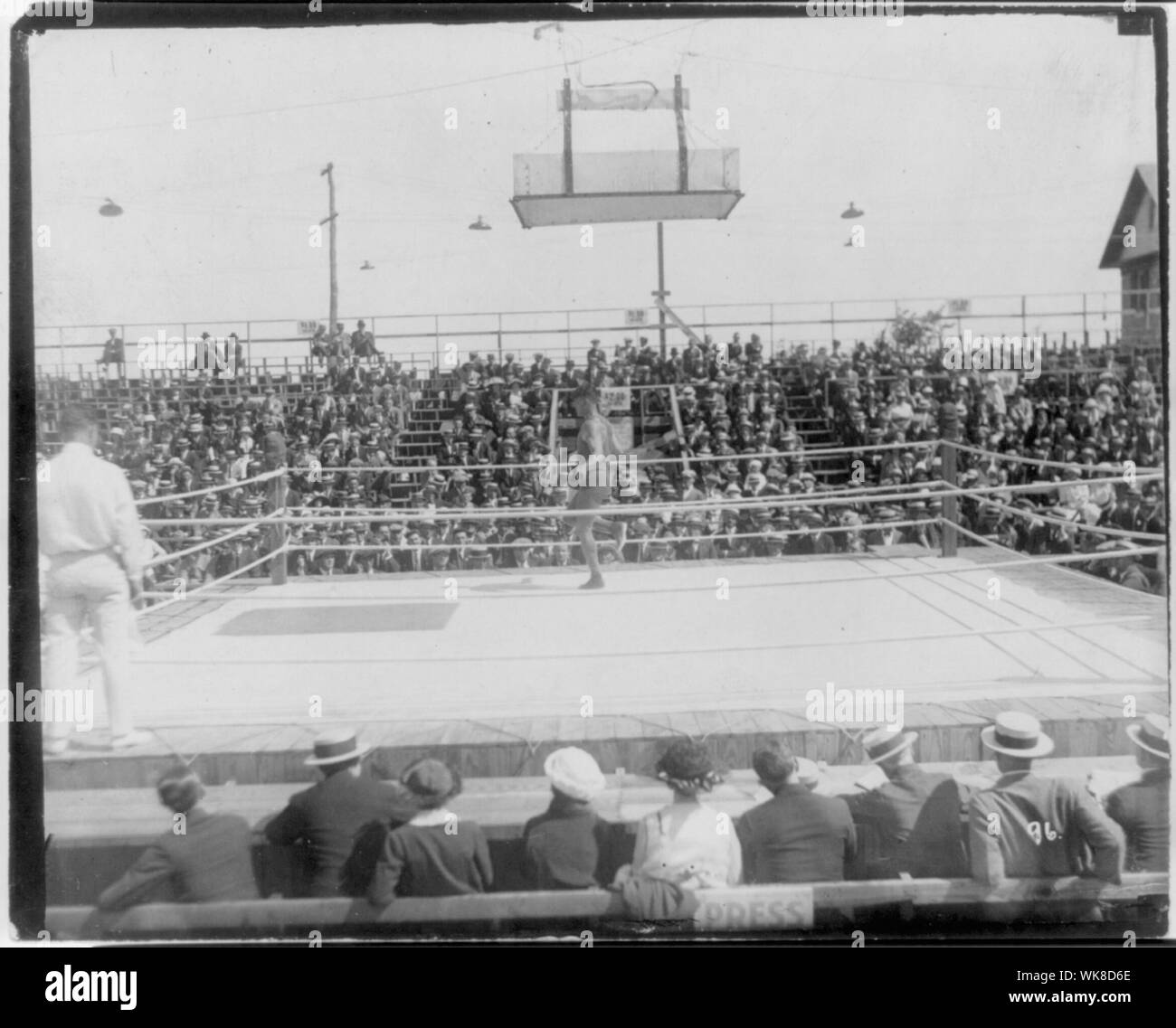 Jack Dempsey at his training camp, June 1921: jumping rope in ring ...