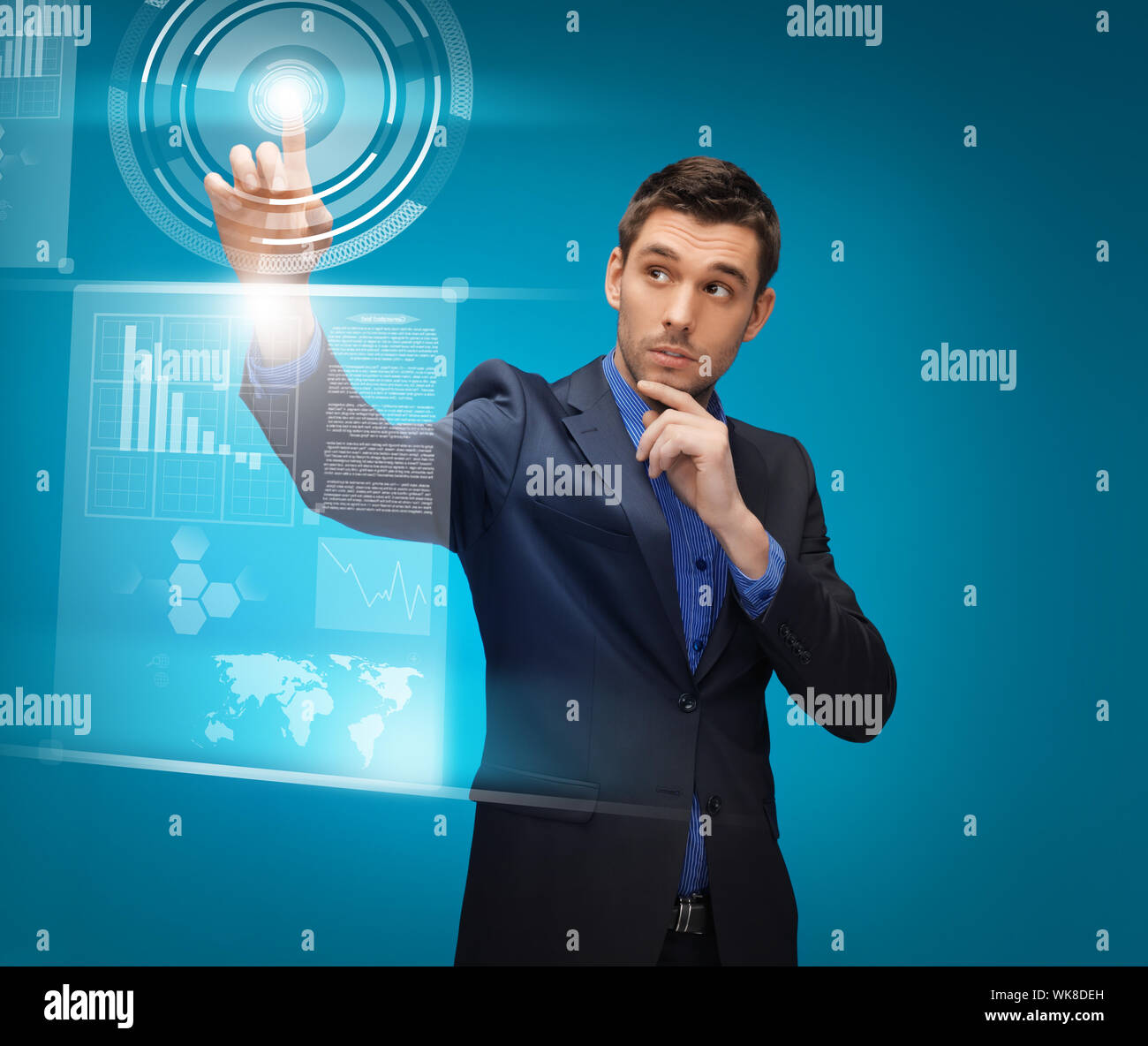 picture of man in suit working with virtual screens Stock Photo - Alamy