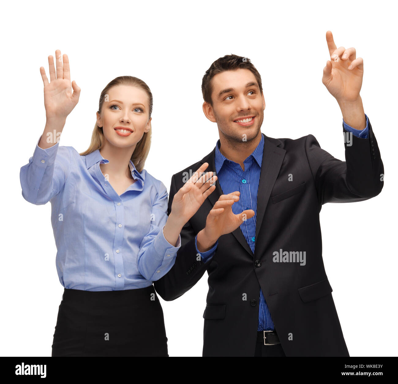 picture of man and woman working with something imaginary Stock Photo ...