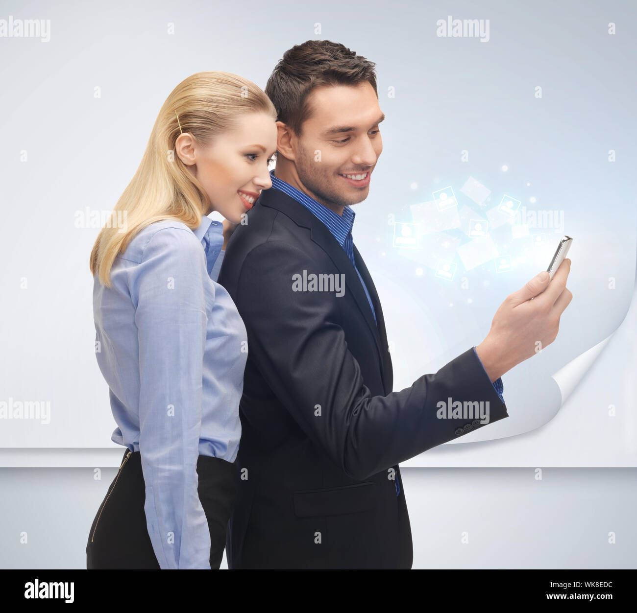 man and woman with smartphone Stock Photo - Alamy