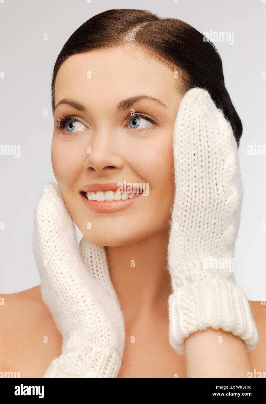 bright picture of beautiful woman in white mittens Stock Photo - Alamy