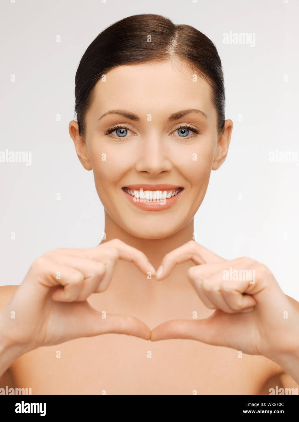 woman showing heart shape Stock Photo - Alamy