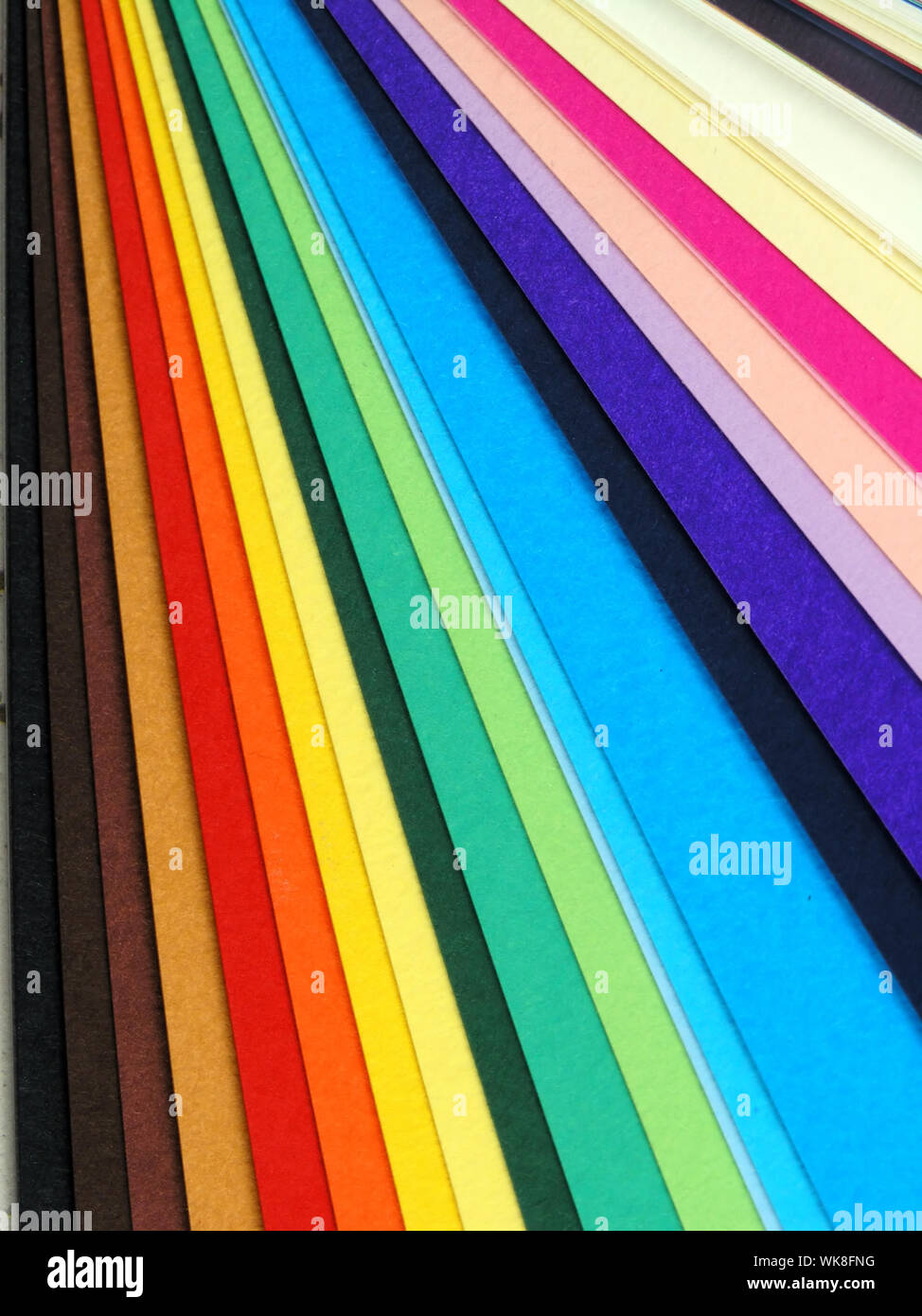 Colored samples of different papers on white background, business cards ...