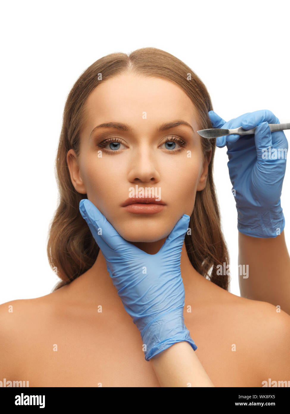 picture of woman face and beautician hands with scalpel Stock Photo - Alamy