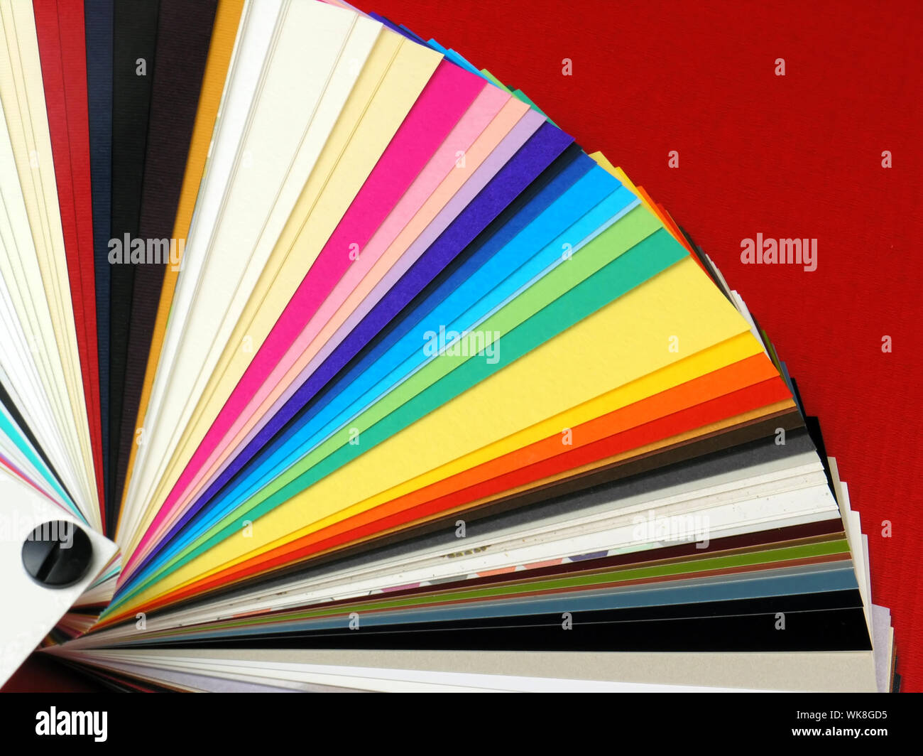 Colored samples of different papers on white background, business cards ...