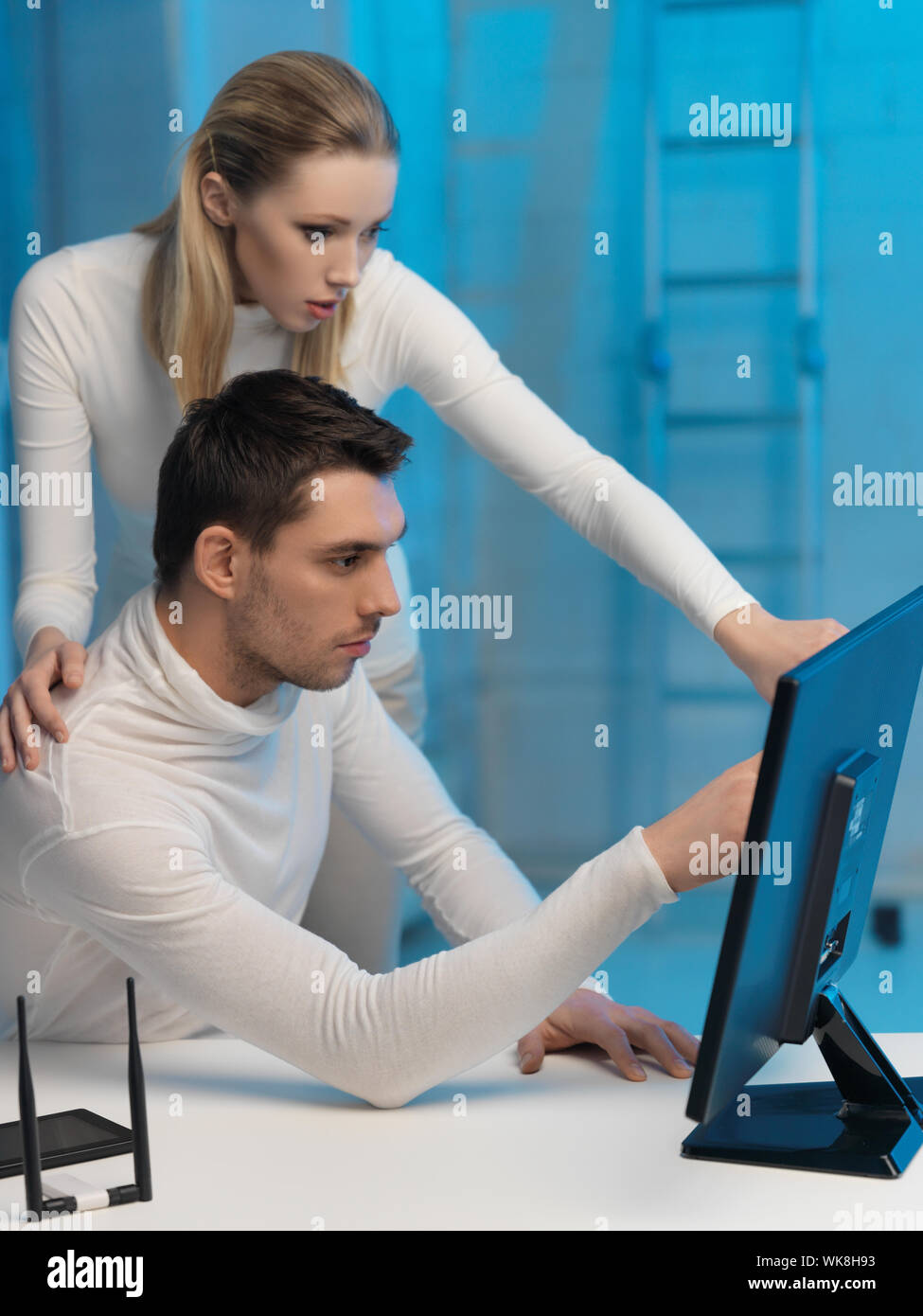 picture of man and woman in space laboratory Stock Photo - Alamy
