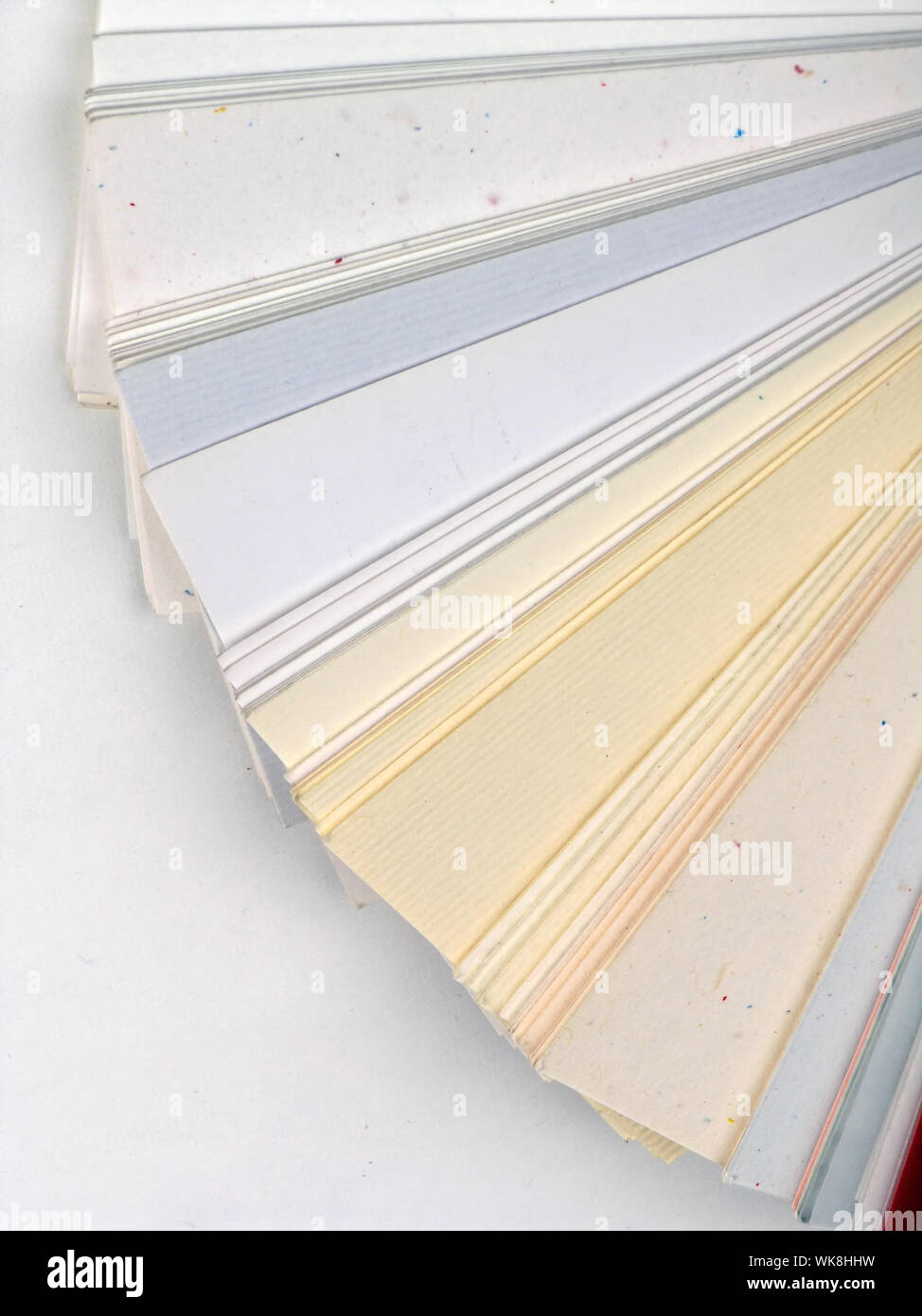 Colored samples of different papers on white background, business cards ...