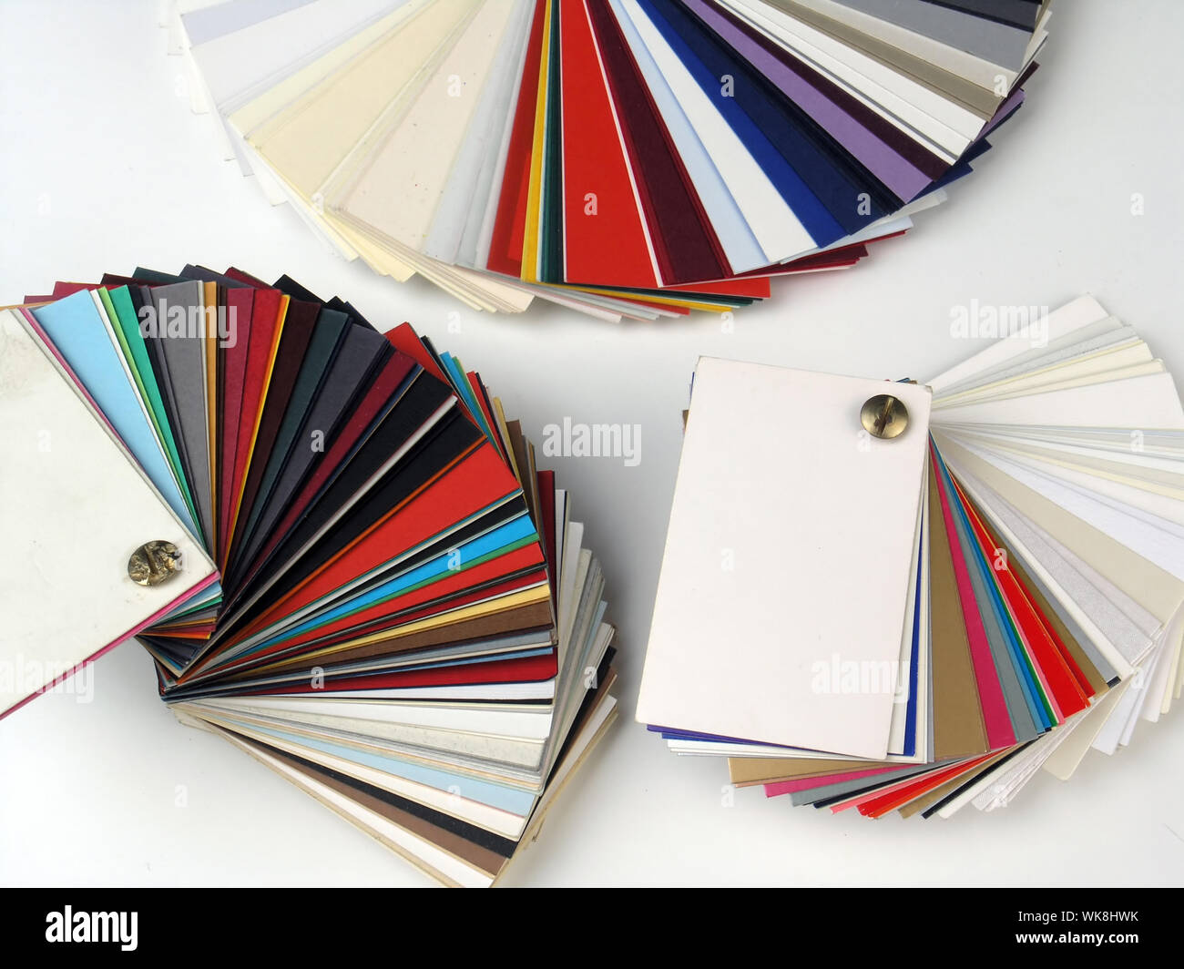 Colored samples of different papers on white background Stock Photo - Alamy