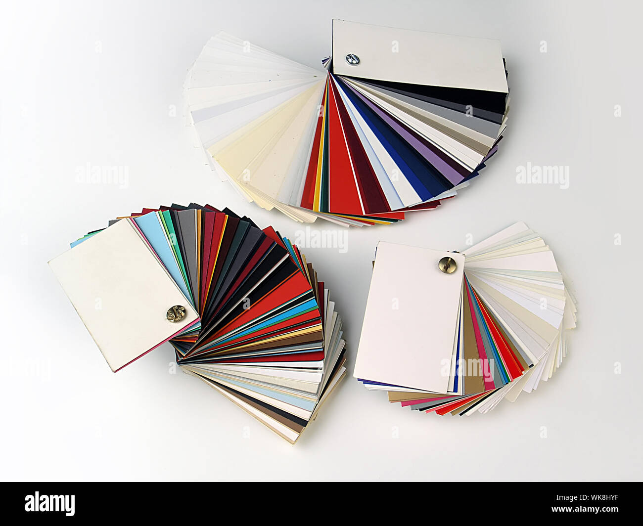 Colored samples of different papers on white background Stock Photo - Alamy