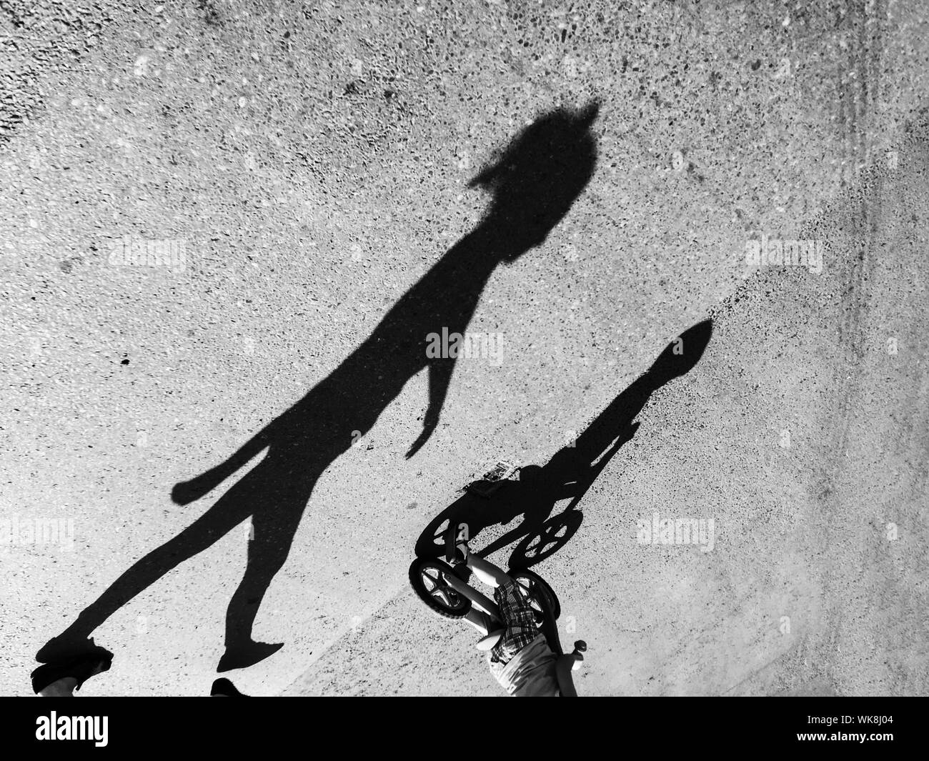 Girl shadow walking hi-res stock photography and images - Alamy