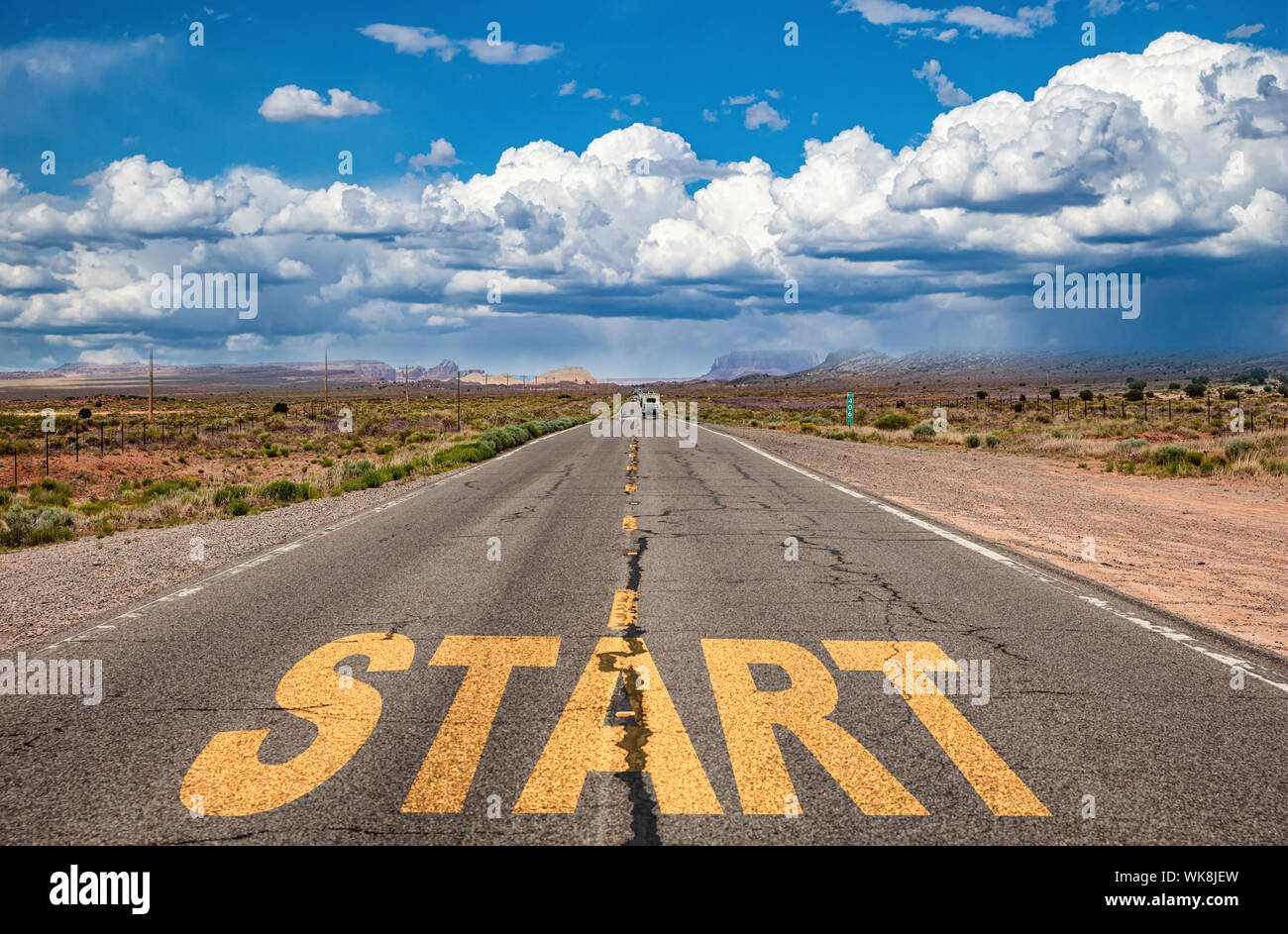Start, new beginning concept. Text sign on a long straight highway in ...