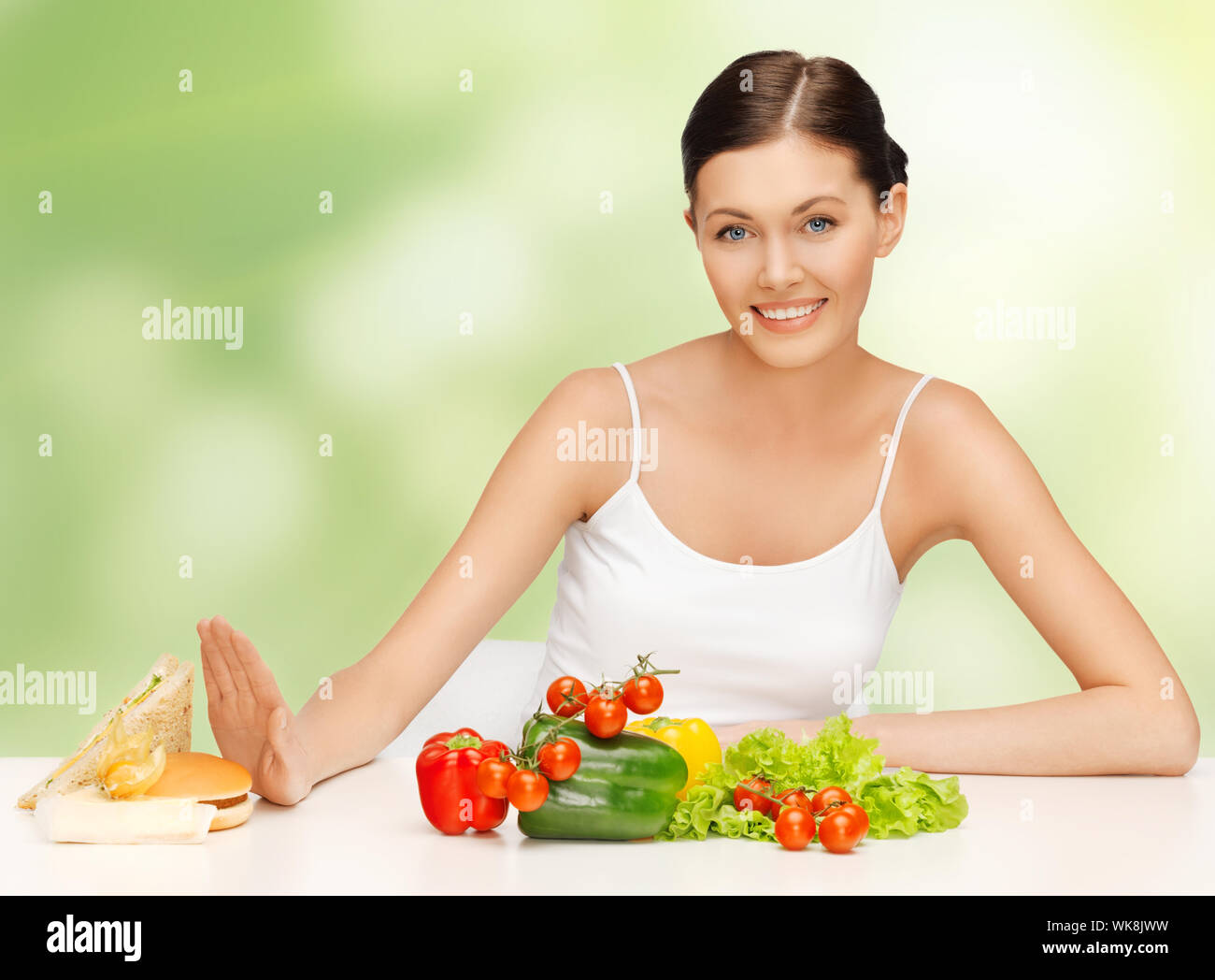 picture of beautiful woman with hamburger and vegetables Stock Photo ...