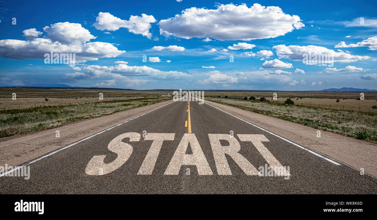 Start, new beginning concept. Text sign on a long straight highway in ...