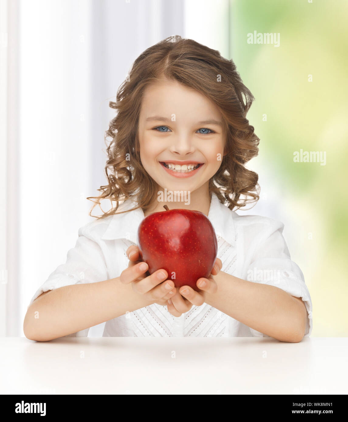 picture of beautiful girl with red apple Stock Photo - Alamy