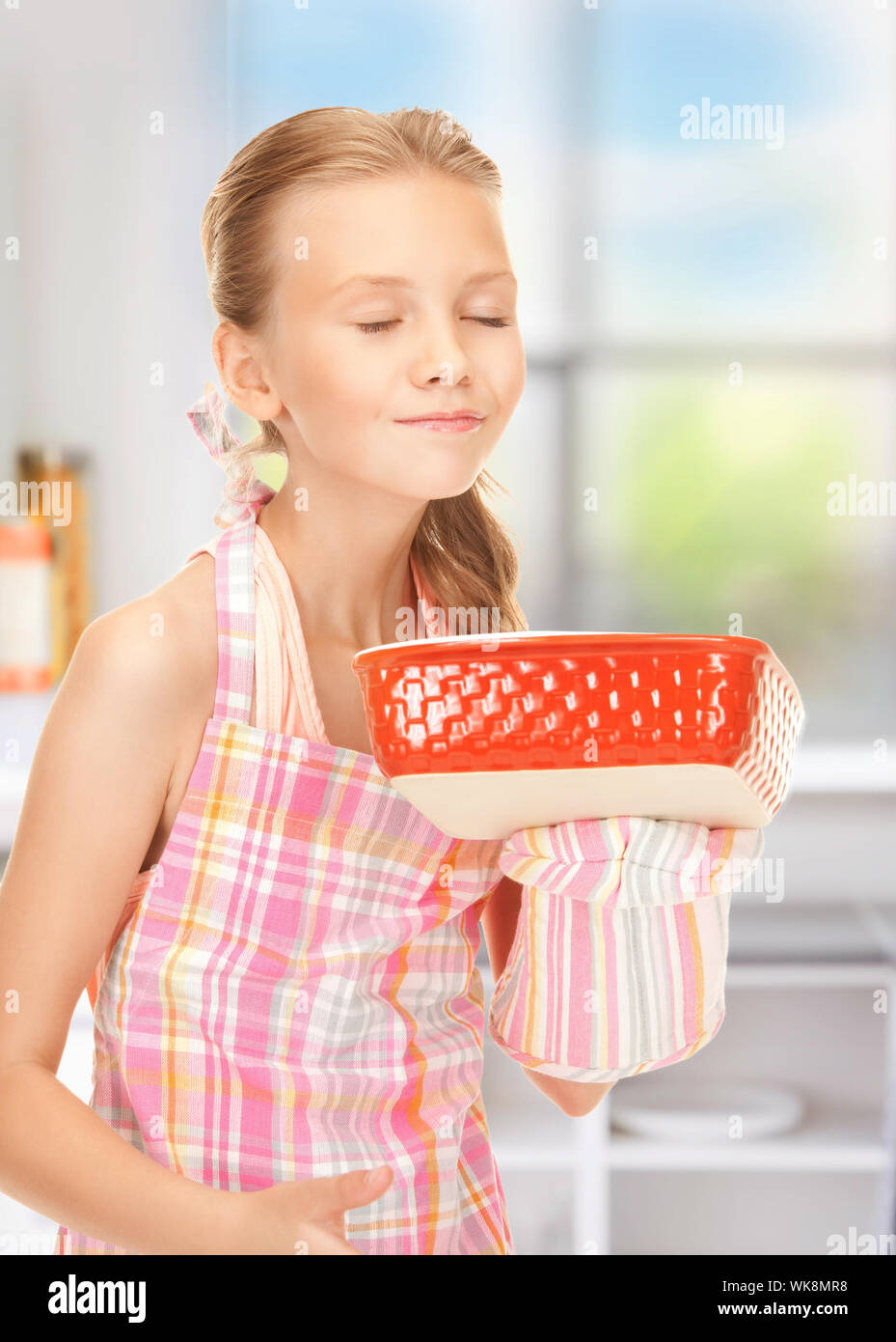 bright picture of cooking girl in the kitchen Stock Photo - Alamy